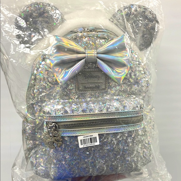 Loungefly | Bags | Loungefly Iridescent Silverer Sequin Minnie Backpack ...